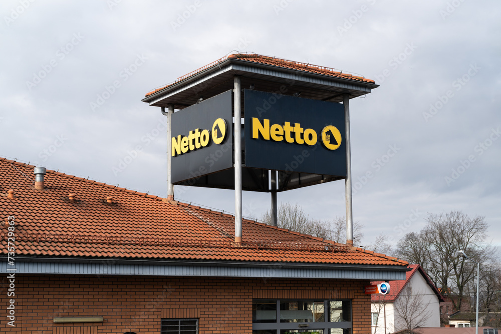 Netto shop signboard with logo sign. Danish discount supermarket ...