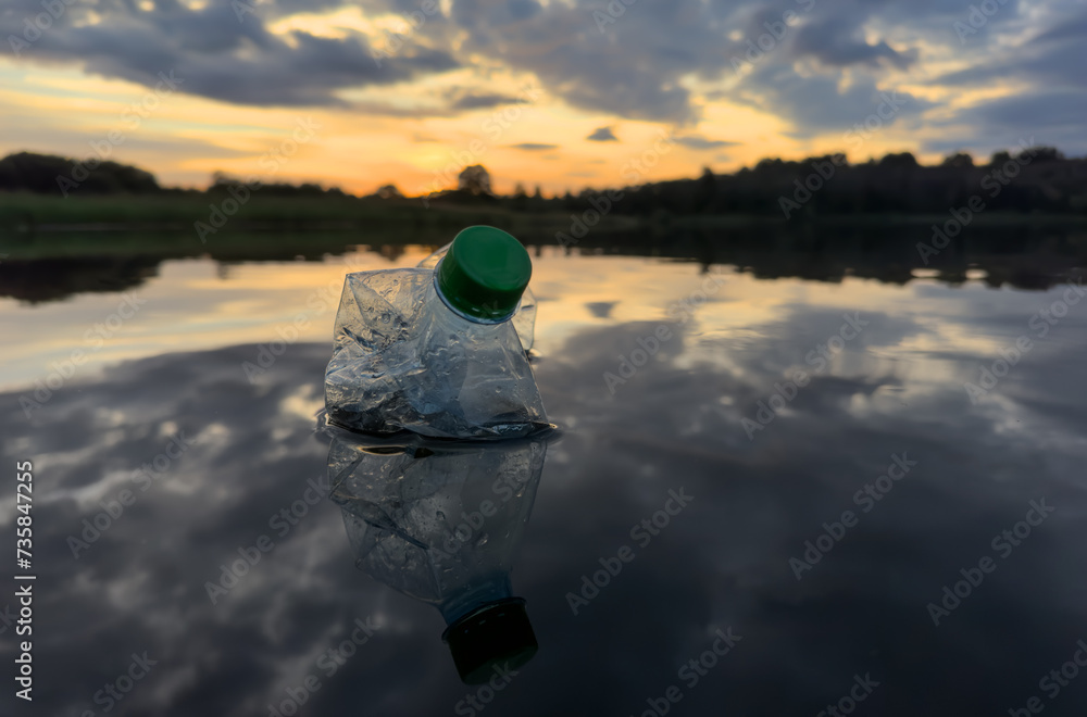 Marine plastic pollution. Plastic waste in lake. Microplastics ...