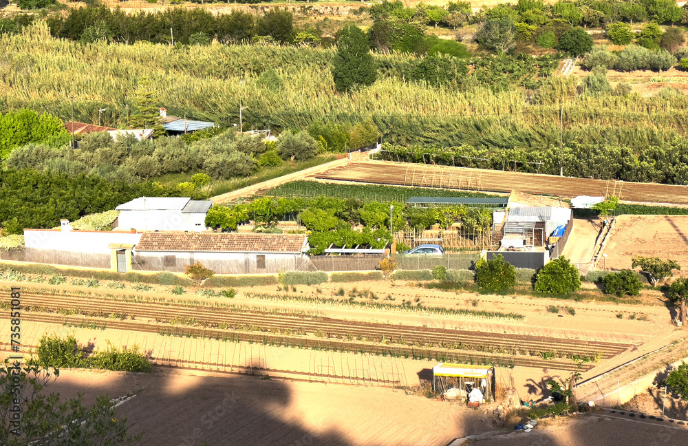 Rural landscape in Segorbe town. Farmhouse at vegetable field. Spain ...