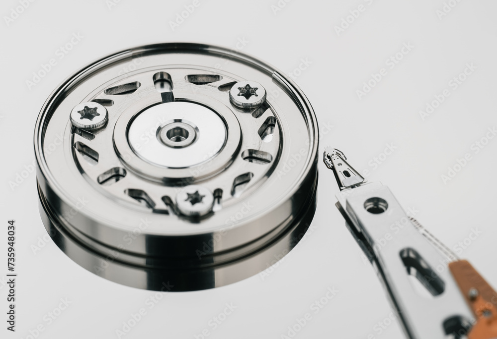Hard drive isolated on white background. HDD. Major components of a 3.5 ... Hard drive isolated on white background. HDD. Major components of a 3.5 ...