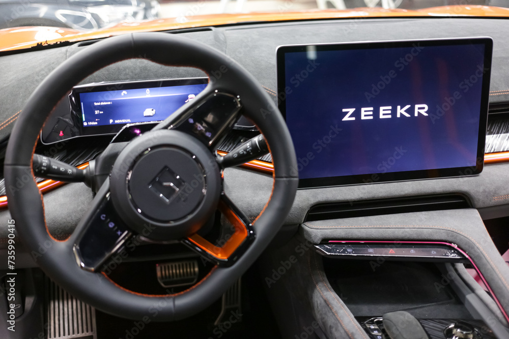 Zeekr 001 EV car interior - dashboard, player, steering wheel with logo ...