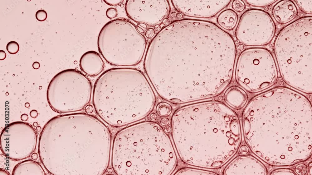 Bubble cluster, cells under a microscope. Transparent cosmetic gel ...