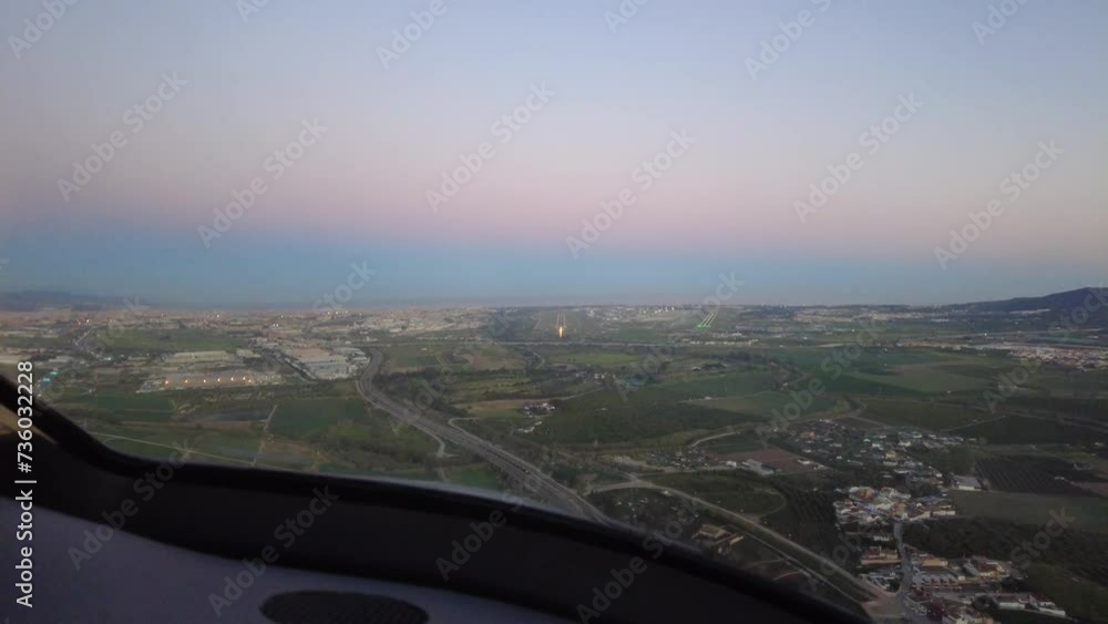 Airplane aircraft jet cockpit view final approach towards airport ...