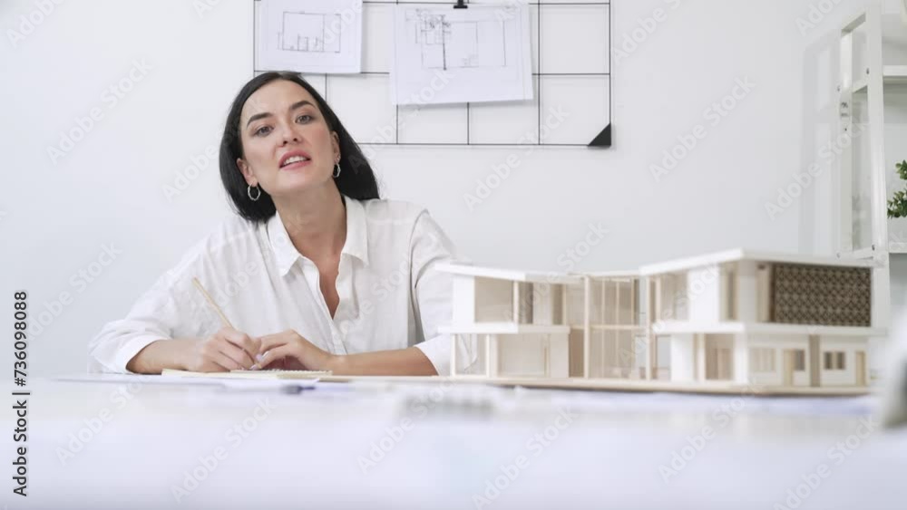 Professional asian male project manager hand puts the map on meeting ...