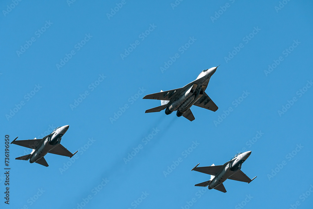 Military air force fighter jet interceptor airplane in full flight ...