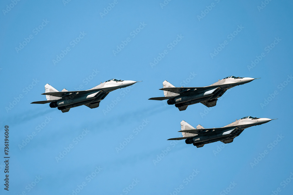Military air force fighter jet interceptor airplane in full flight ...
