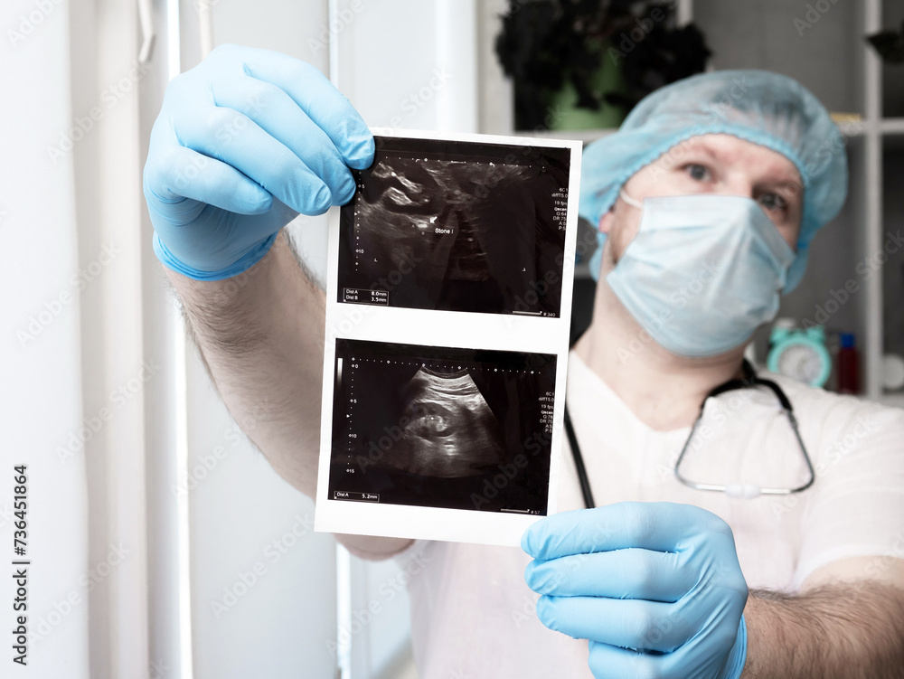 Doctor with a stethoscope in the office clinic, analyzes the disease of ...
