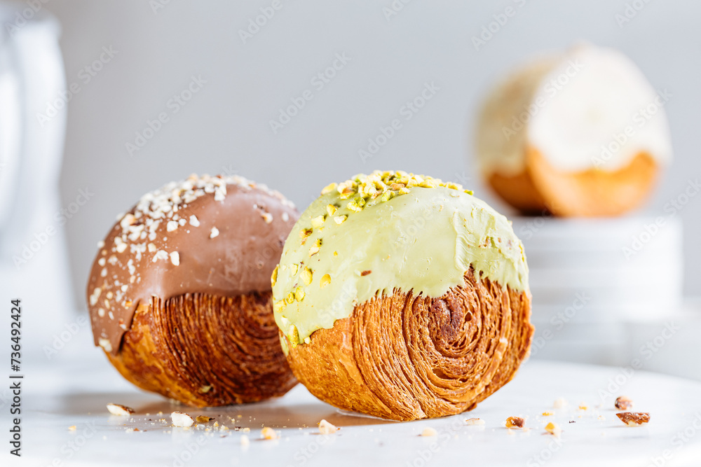 Fusion croissant called Cromboloni invented in New York. Round puff ...