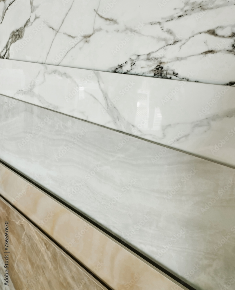 Black Porcelain tiles, marble tiles, shelving of different tiles ...