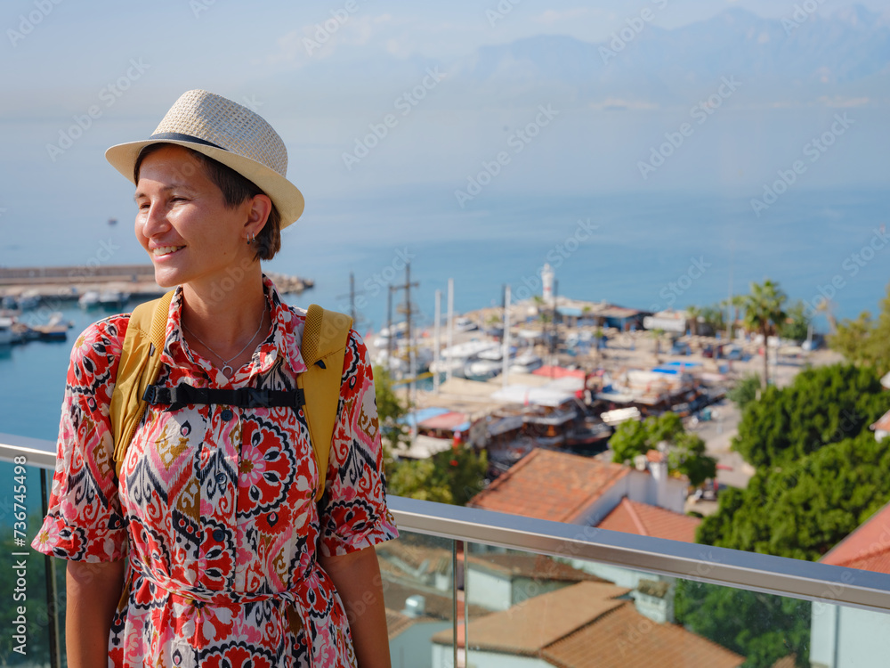 female summer travel to Antalya, Turkey. young asian woman in red dress ...