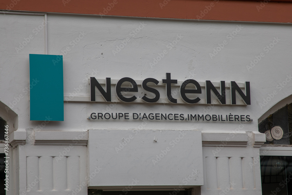 Nestenn group sign brand and text logo facade of office real estate ...