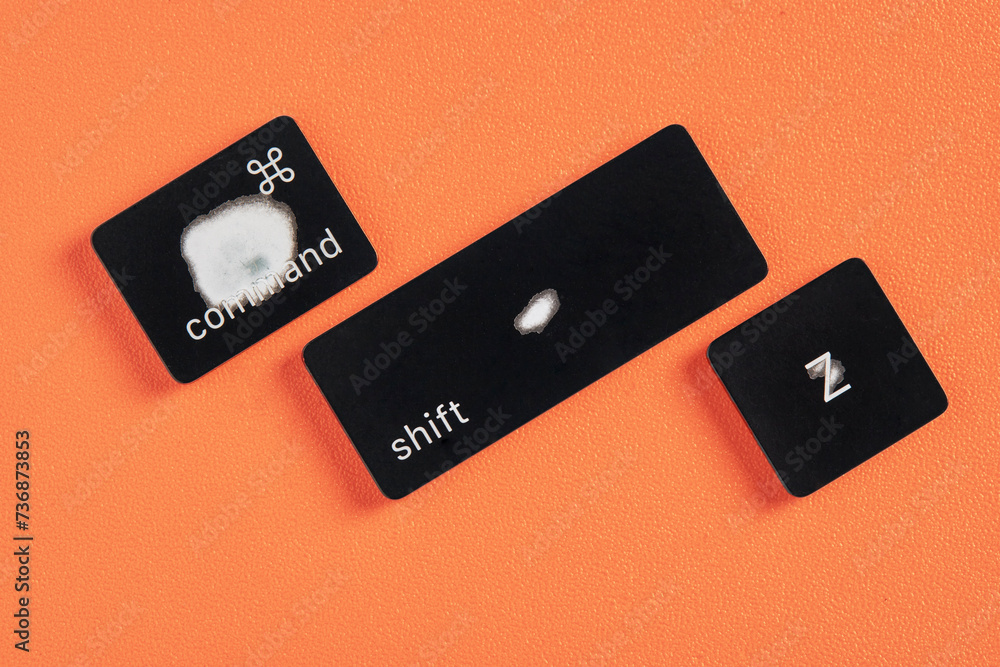 The command key, shift key and Z key are worn out due to frequent use ...