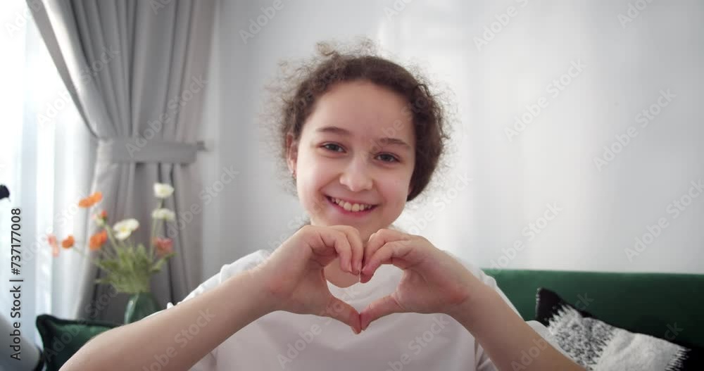 Beautiful happy little cute child face adorable girl kid seen through ...