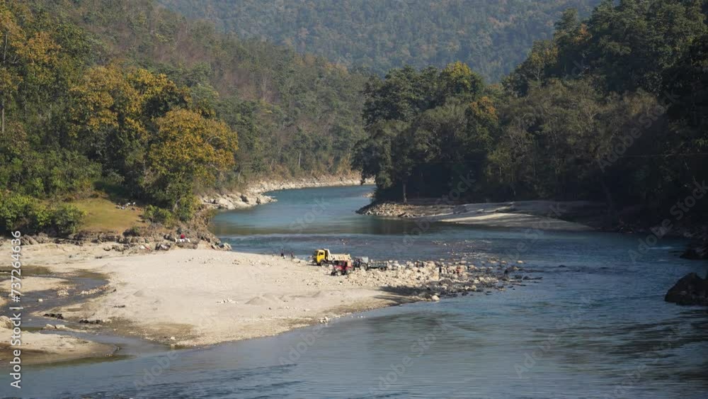 Mesmerizing beauty of Nepal as a river gracefully flows through ...