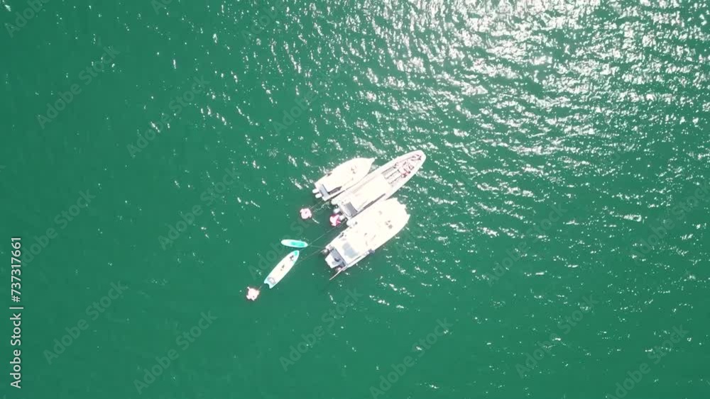 Vidéo Stock Drone video of boats and yachts from above on azure sea ...