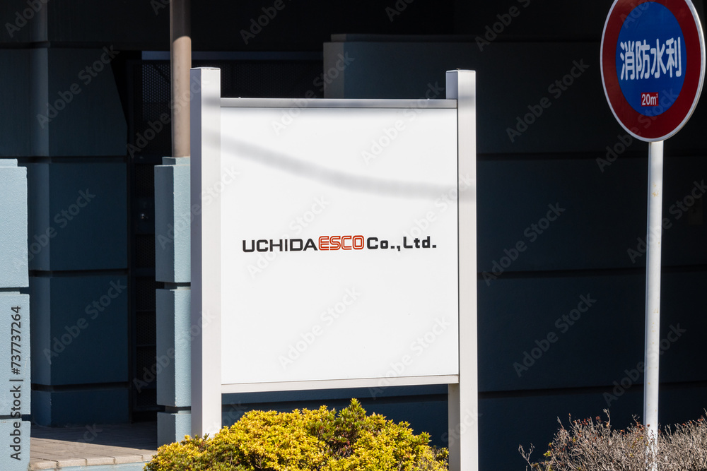 Tokyo, Japan, 3 November 2023: Uchida Esco company sign with traffic ...