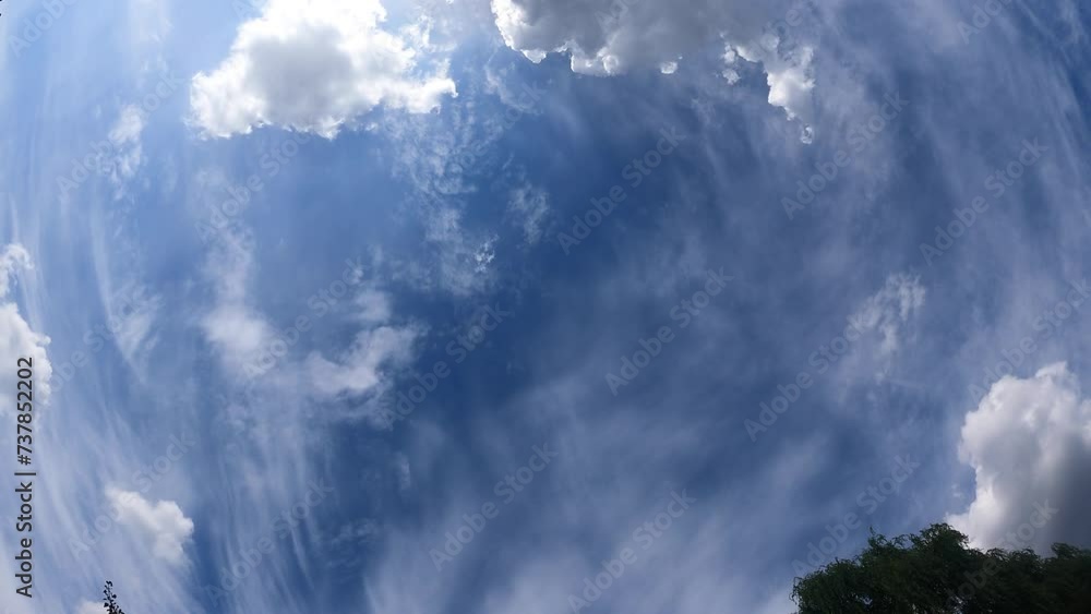 This striking time-lapse footage showcases the majestic beauty of cloud formations evolving ...
