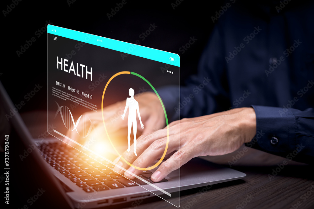 The man is using a computer with a body mass index (BMI) calculation ...