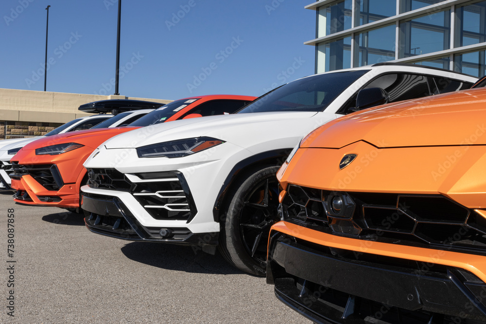 Lamborghini Urus SUV display at a dealership. Lamborghini also offers ...