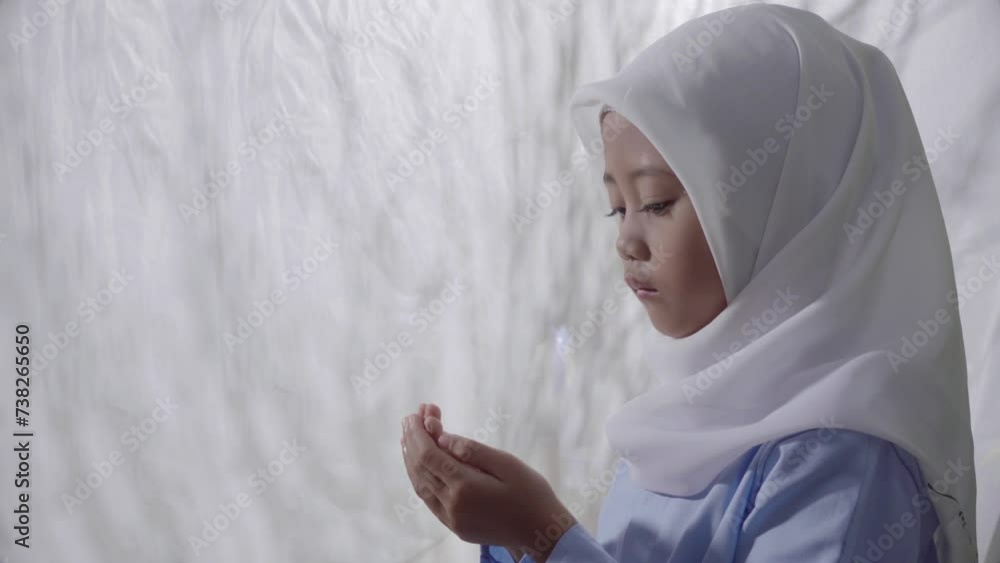 Asian cute girl praying closed eyes to God asking for blessing, help ...