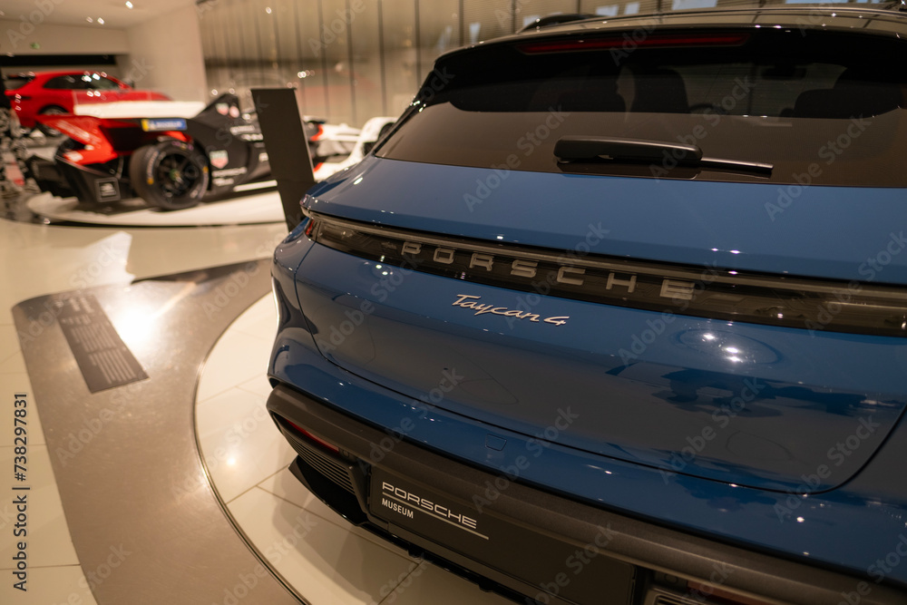 blue Porsche Taycan 4 Cross Turismo Electric Vehicle rear view, battery ...