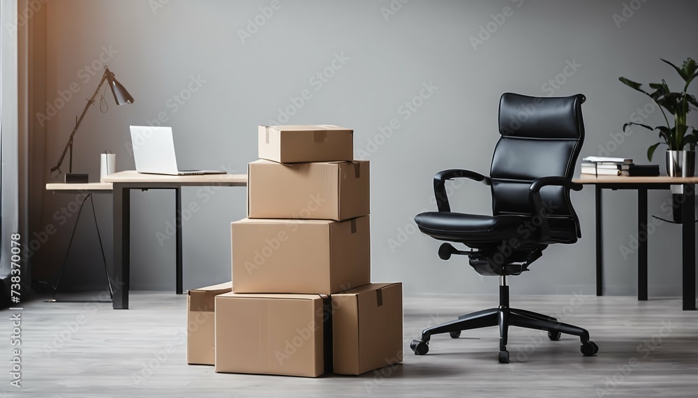 Stack of cardboard boxes and office chair in an empty office room ...