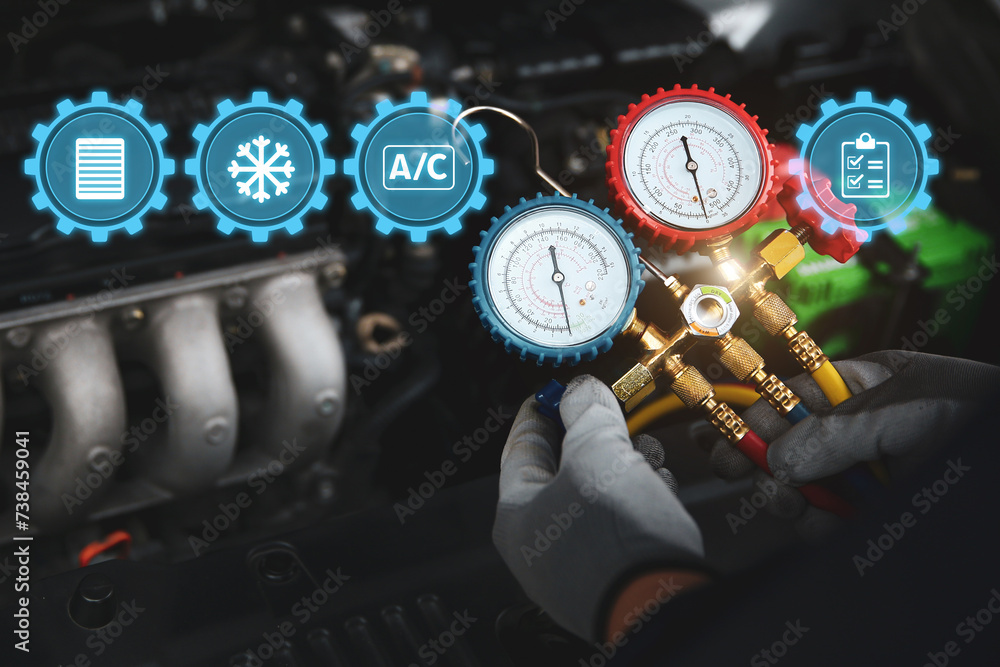 Hand technician auto mechanic using measuring manifold gauge with car ...