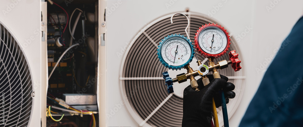 Heat and Air Conditioning, HVAC system service technician using ...