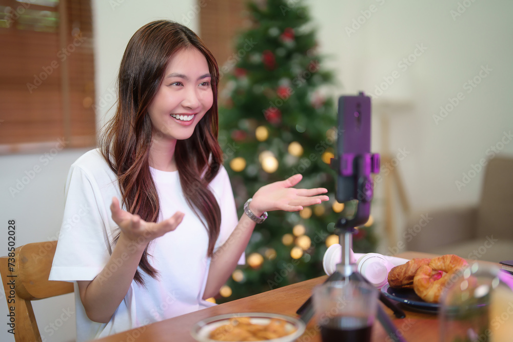 Foto de Young asian vj women use digital smartphone and recording video ...