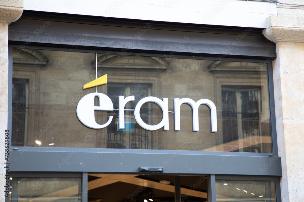 eram entrance shop brand logo chain and sign text on wall facade fashion front store Stock Photo ...
