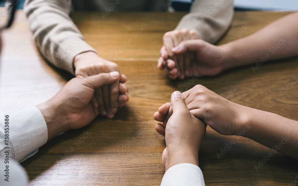 Christian and prayer. Christian group of people holding hands praying ...