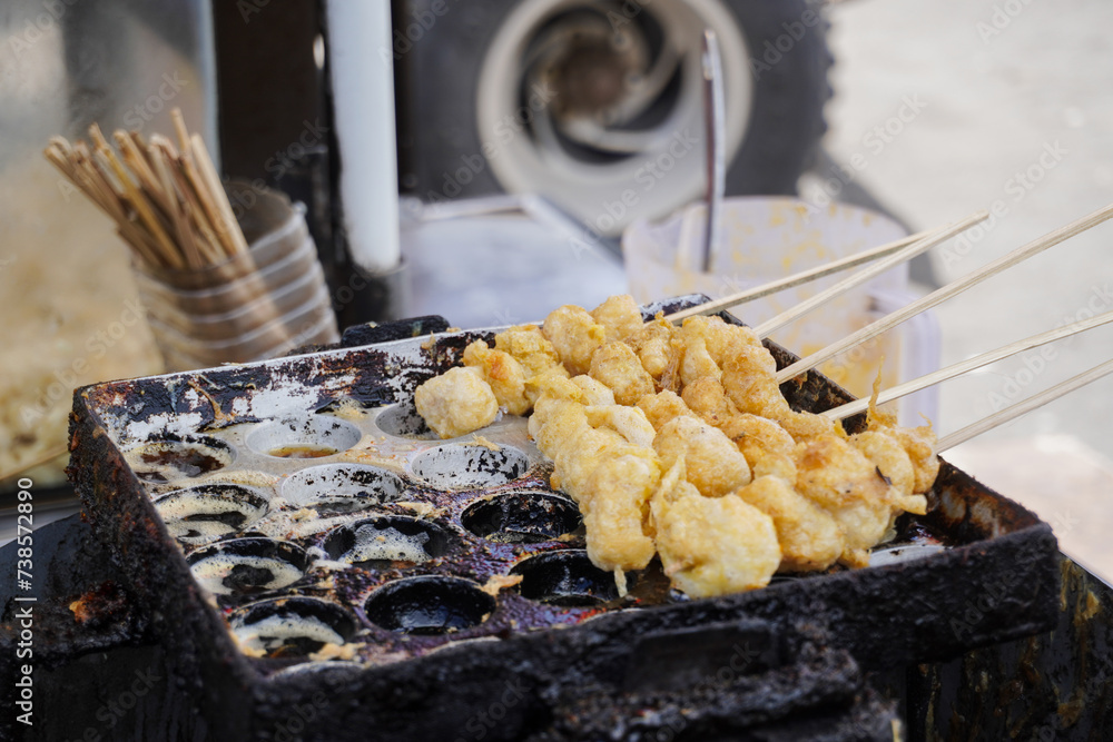 Making cilok, made from tapioca flour with egg. Cilok is an Indonesian ...