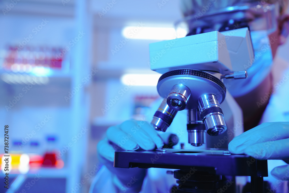 Asian middle-aged male scientist conducts research in a laboratory ...