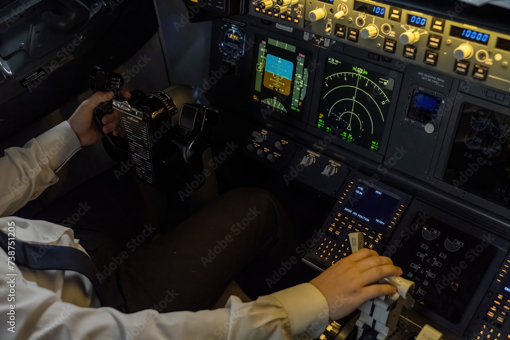 Pilot holds helm placing hand on engine control lever. Man years of ...