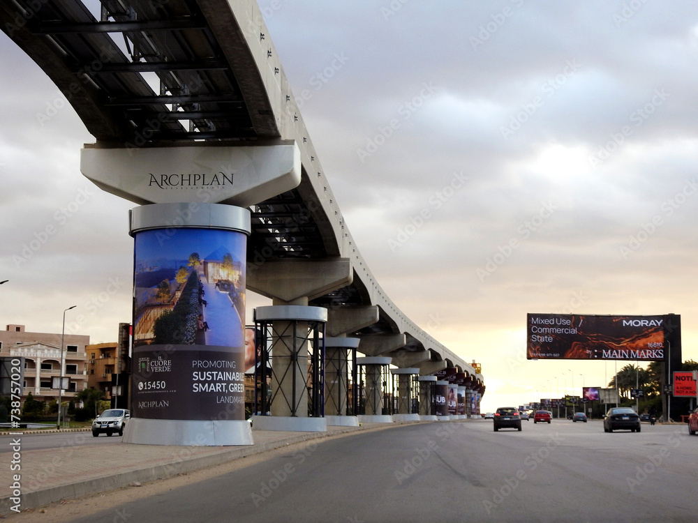 Cairo, Egypt, January 26 2024: Archplan developments advertisement on Cairo monorail columns ...