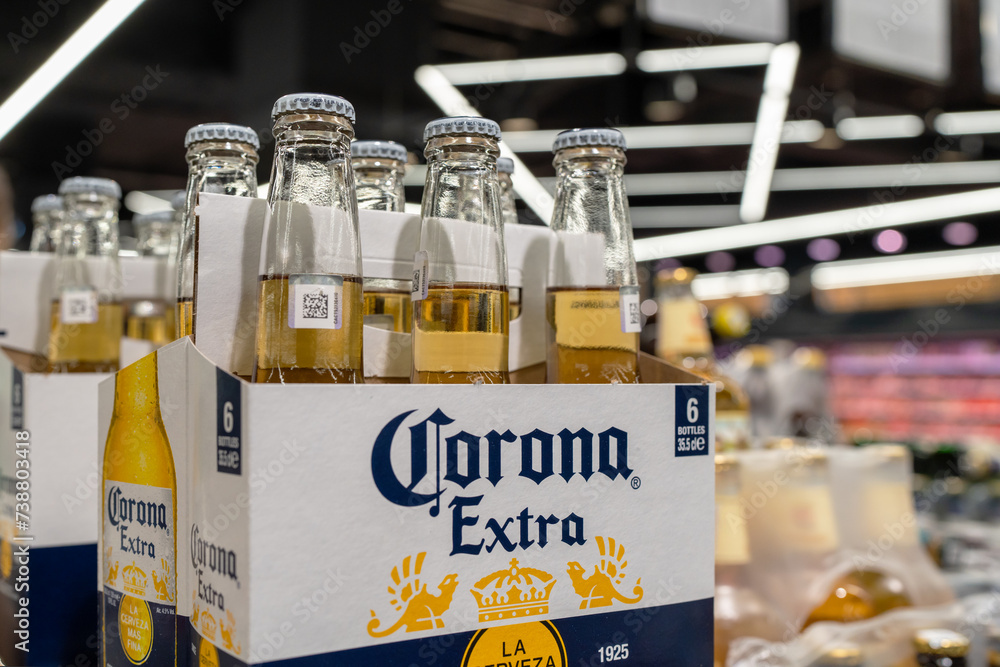 Foto de Pack of Corona Extra Beer. Corona Extra glass bottles at the grocery store. Minsk ...