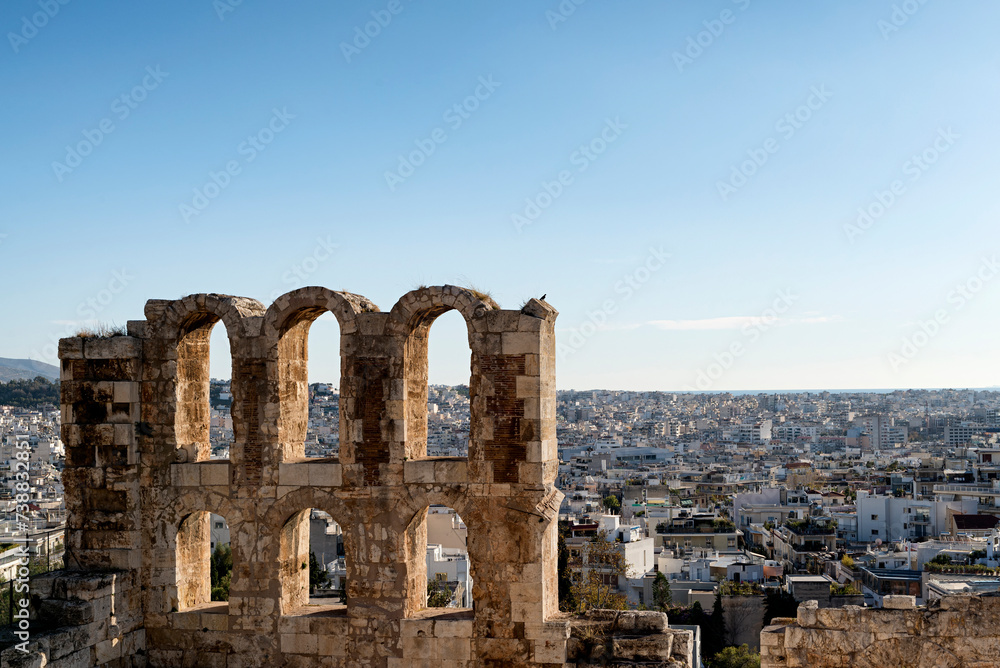 City view of Athens with the arches of Odeon of Herodes Atticus in the ...