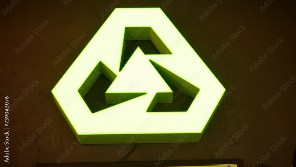Close-up of an illuminated recycling and waste sorting sign at a care ...