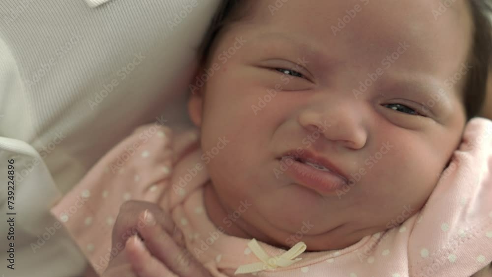 close up adoable newborn baby face Infant baby girl just finish ...