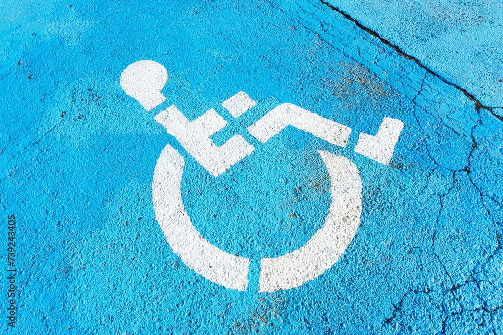 Disabled parking background. Asphalt blue paint. Wheelchair icon ...