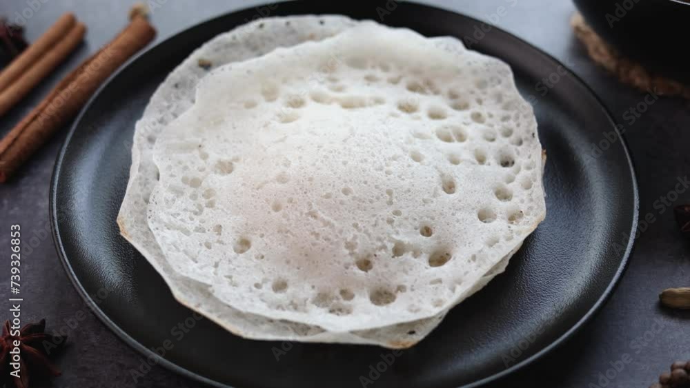 Vidéo Stock Women cooking making Appam Kerala breakfast food best ...