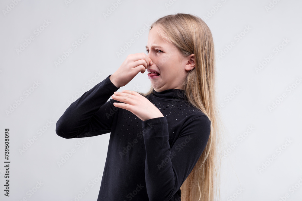 Grimacing, nose pinched, signaling something highly unpleasant Stock ...