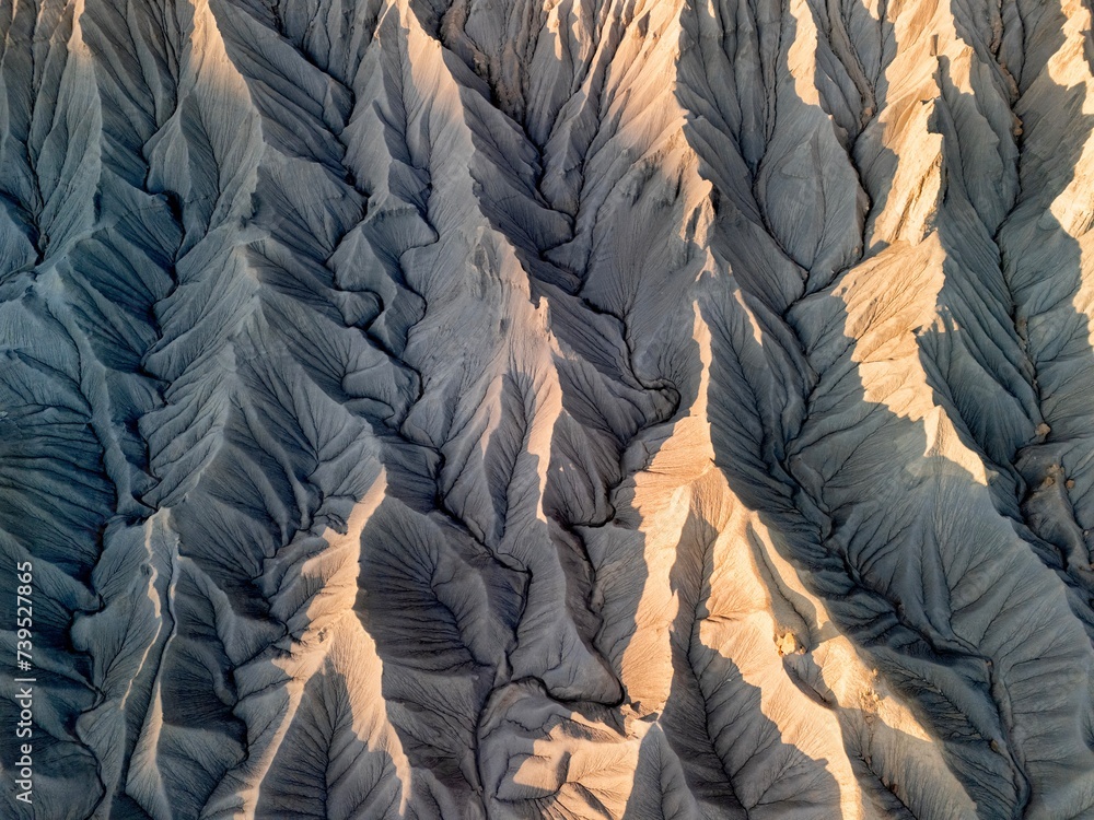 Drone photography of eroded desert badlands. Ridges and canyons of ...