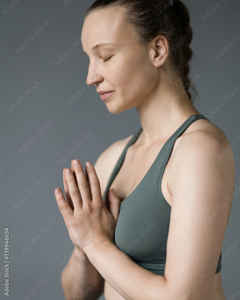 Yoga woman meditates with closed eyes. namaste. girl thanks. Woman with ...