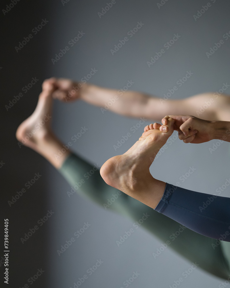 Foto de Women's bare feet. Extended Hand To Big Toe Pose. Yoga, asana ...