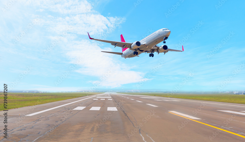 White Passenger plane fly up over take-off runway from airport Stock Photo | Adobe Stock