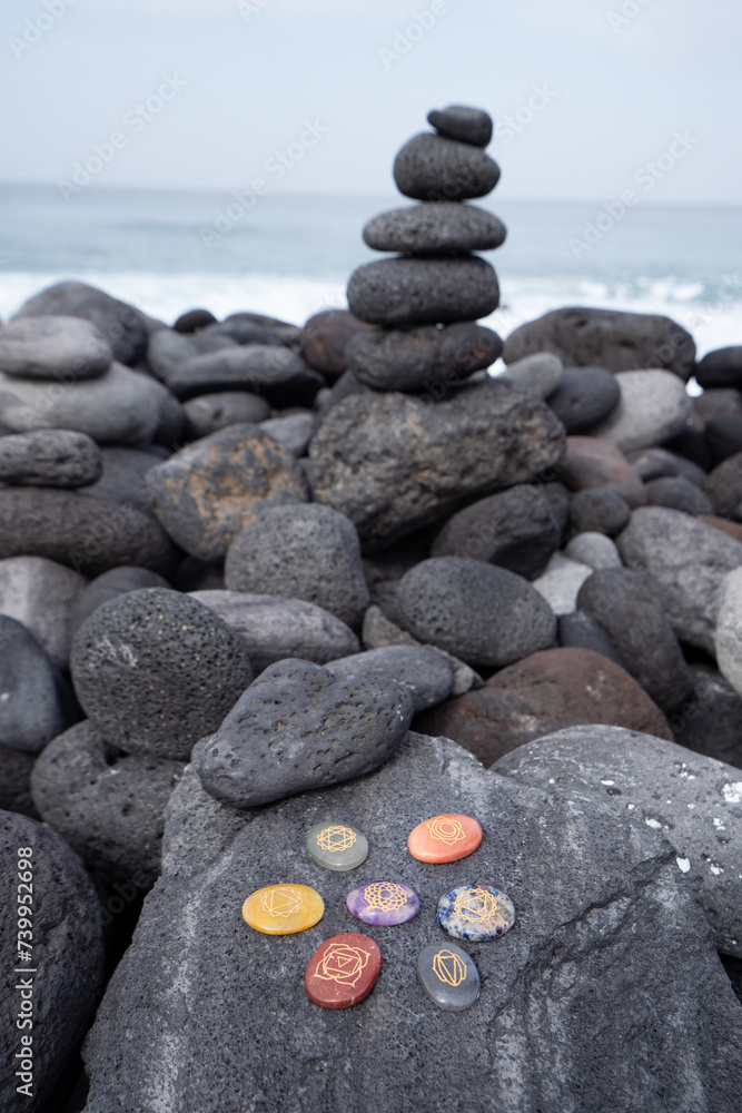 Stone baech and chakra healing crystals. Witchcraft, herbal medicine ...