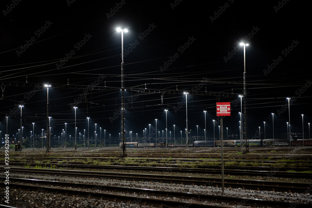 Freight station at night in Zurich, Spreitenbach. Freight trains are ...