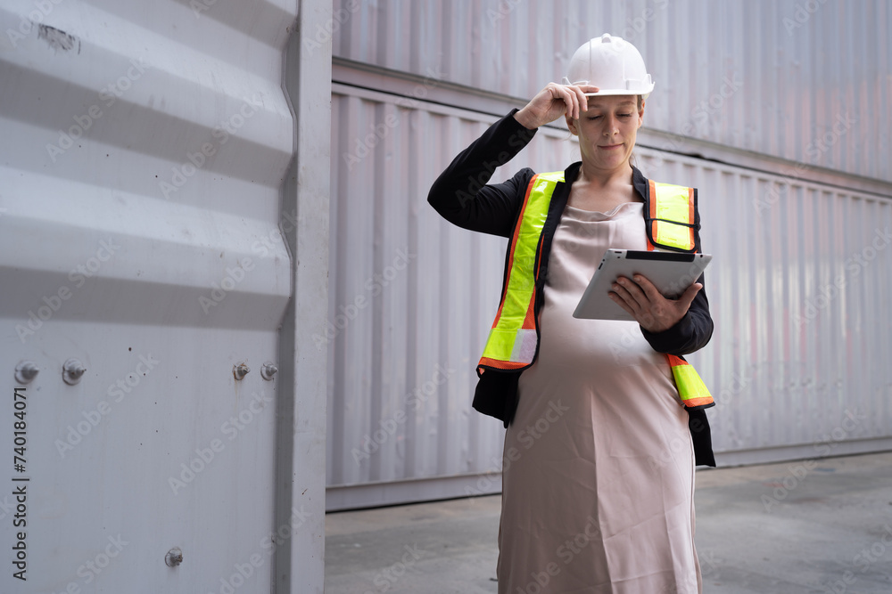 Logistic worker engineer pregnant woman use tablet computer working and ...