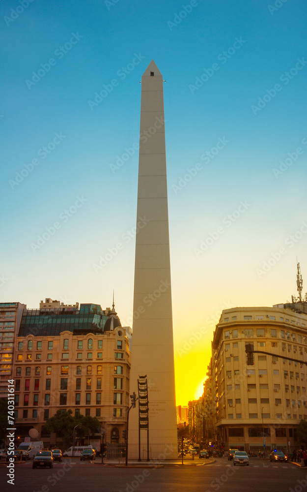 Obelisk of Buenos Aires, Argentina at Sunset. Golden hues paint the sky ...